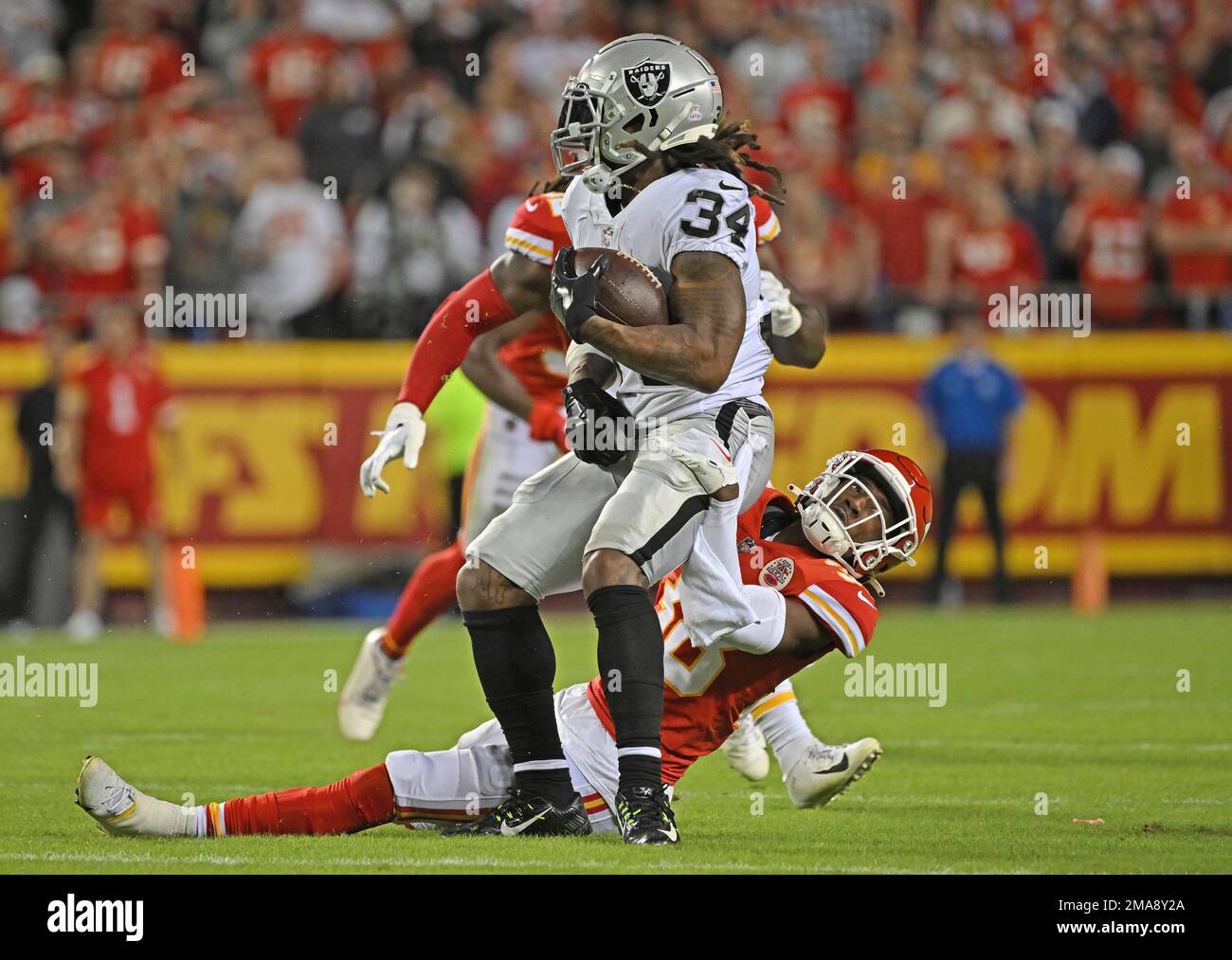 Kansas City Chiefs cornerback L'Jarius Sneed (38) tackles Las Vegas ...