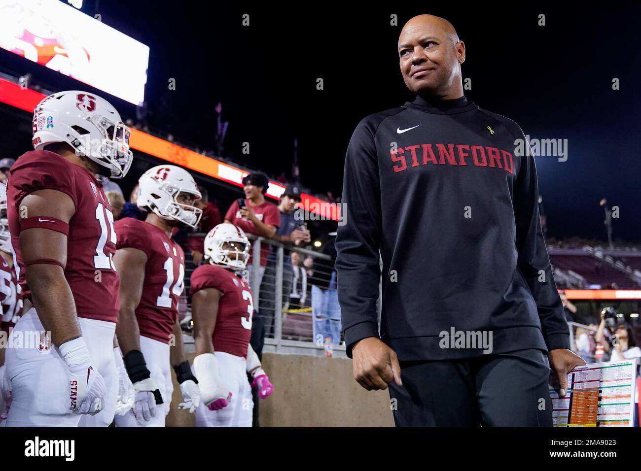 Stanford head coach David Shaw and his team wait to be introduced ...