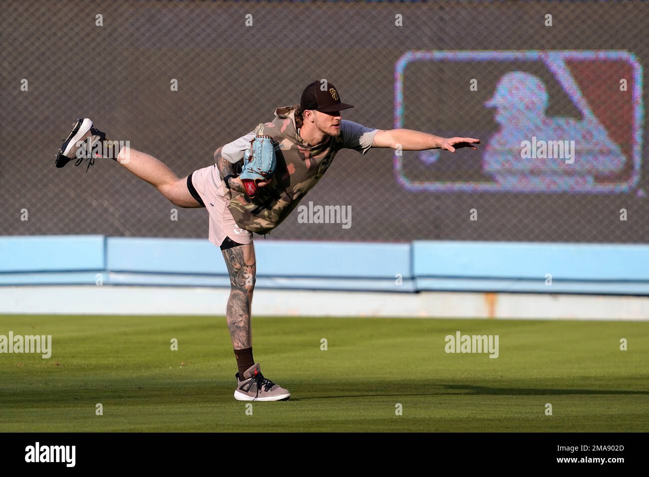 San Diego Padres' pitcher Josh Hader stretches in the outfield during ...