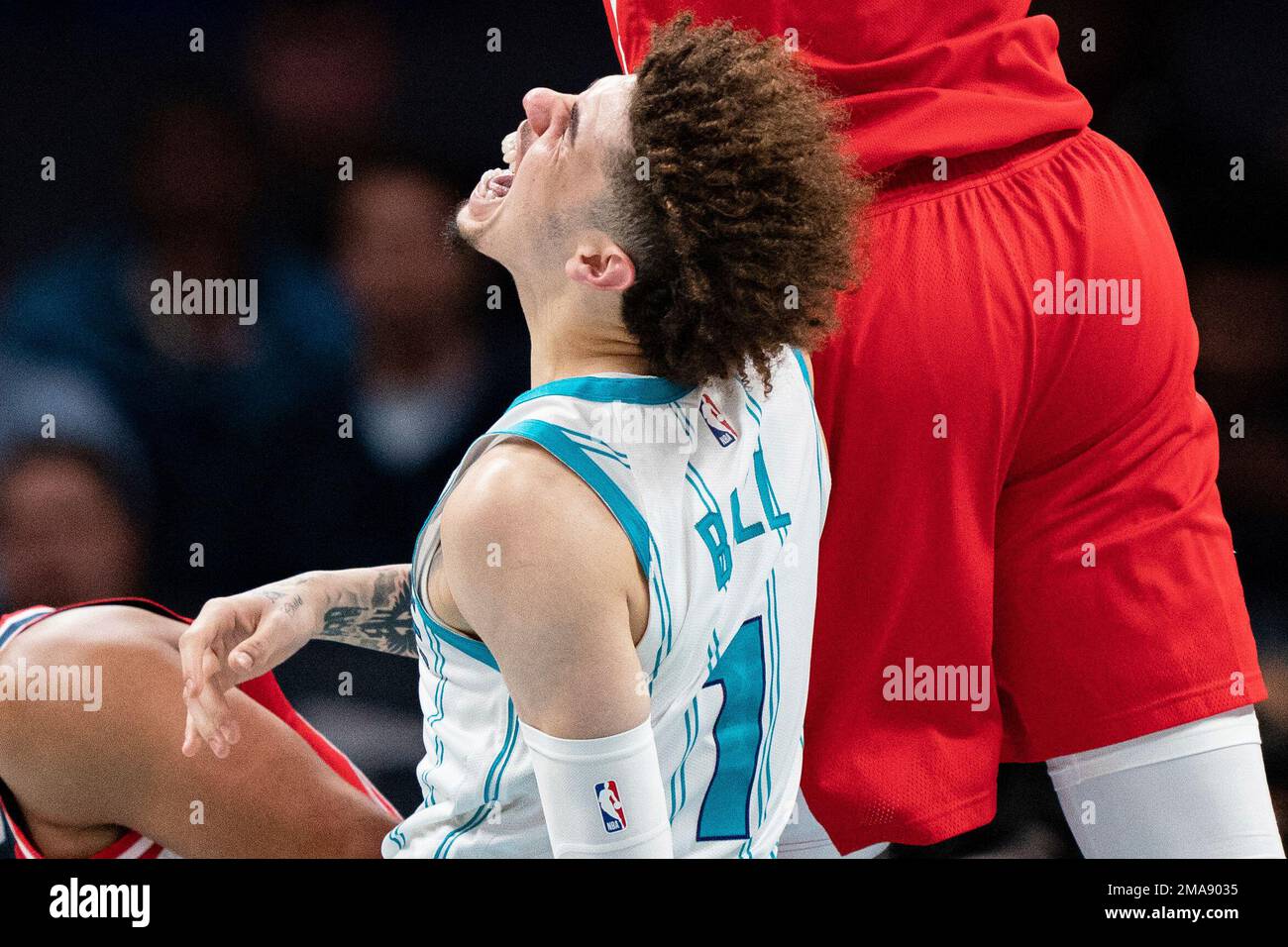Charlotte Hornets guard LaMelo Ball is shaken up on a play in the ...