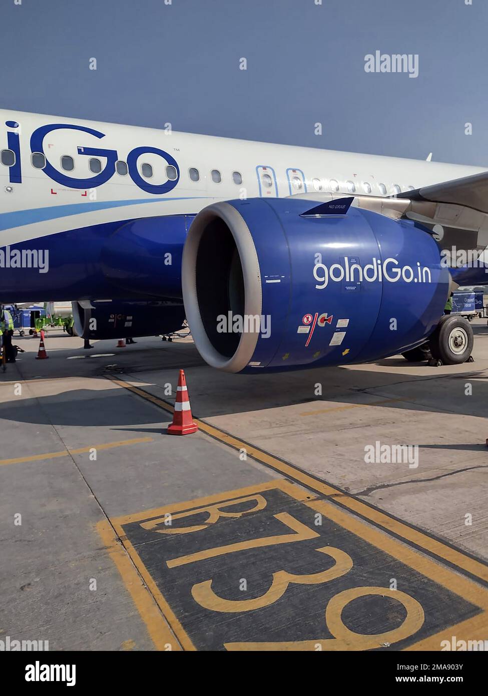 Airplane on the airport runway - indian airline Stock Photo - Alamy