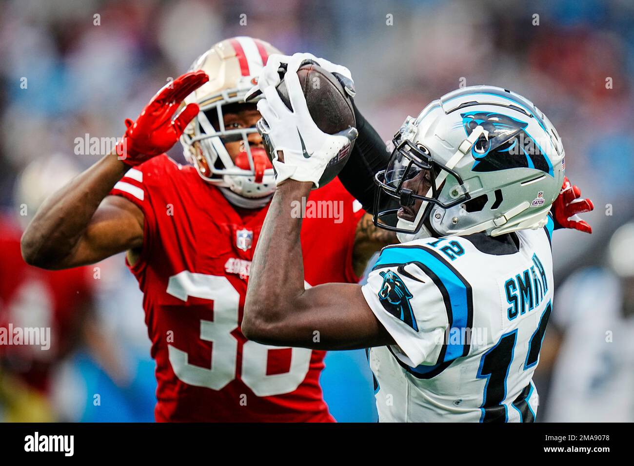 Carolina Panthers wide receiver Shi Smith (12) grabs a reception over ...