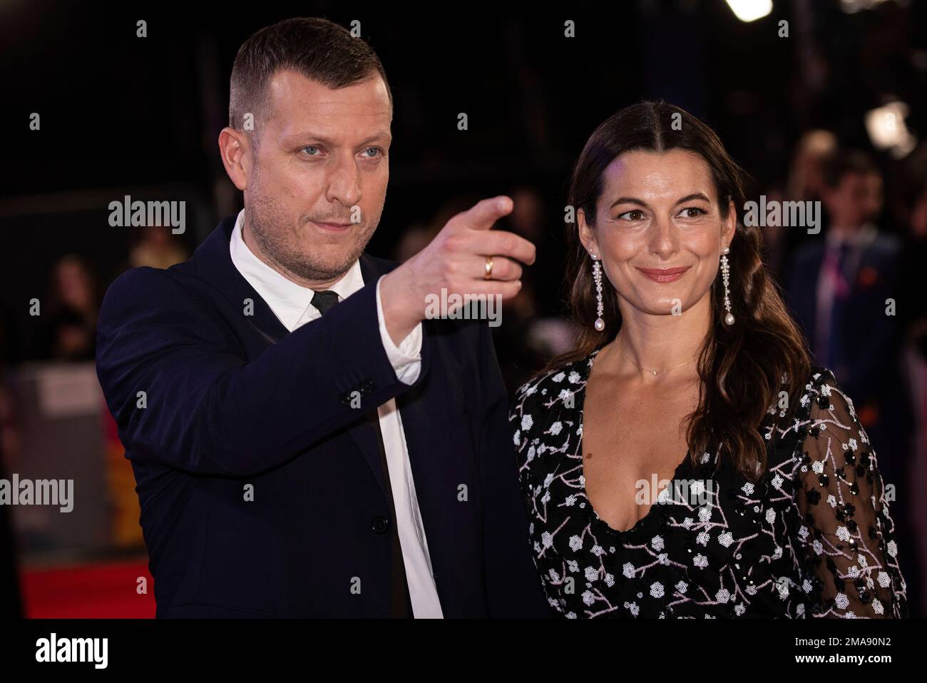 Tobias Lindholm and Caroline Blanco pose for photographers upon arrival ...