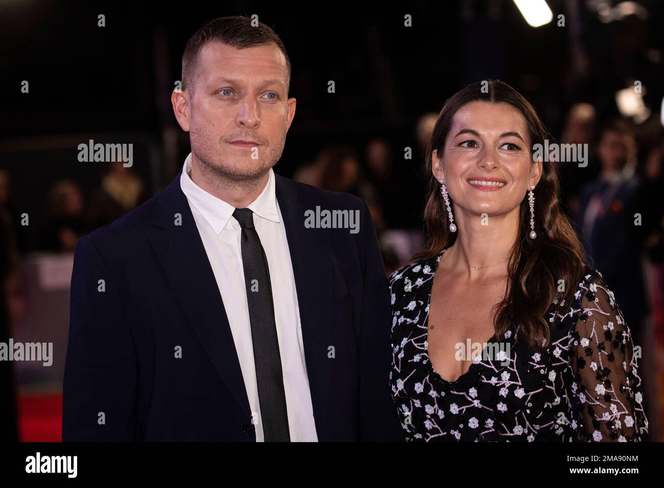 Tobias Lindholm and Caroline Blanco pose for photographers upon arrival ...