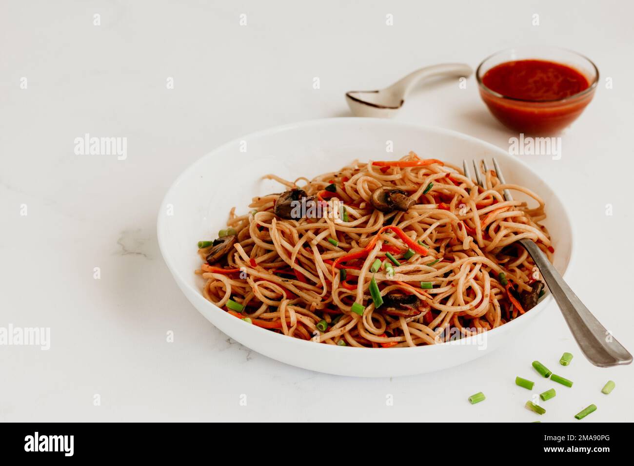 Asian Stir Fried Chow Mein with Sauce Low Angle Food Photo on White ...