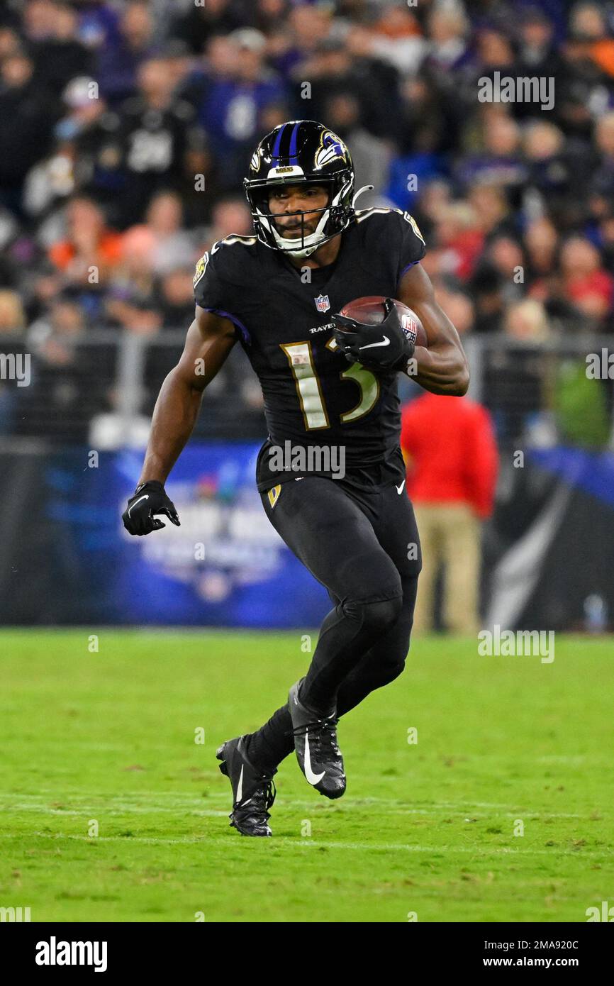 Baltimore Ravens wide receiver Devin Duvernay (13) runs with the ball ...