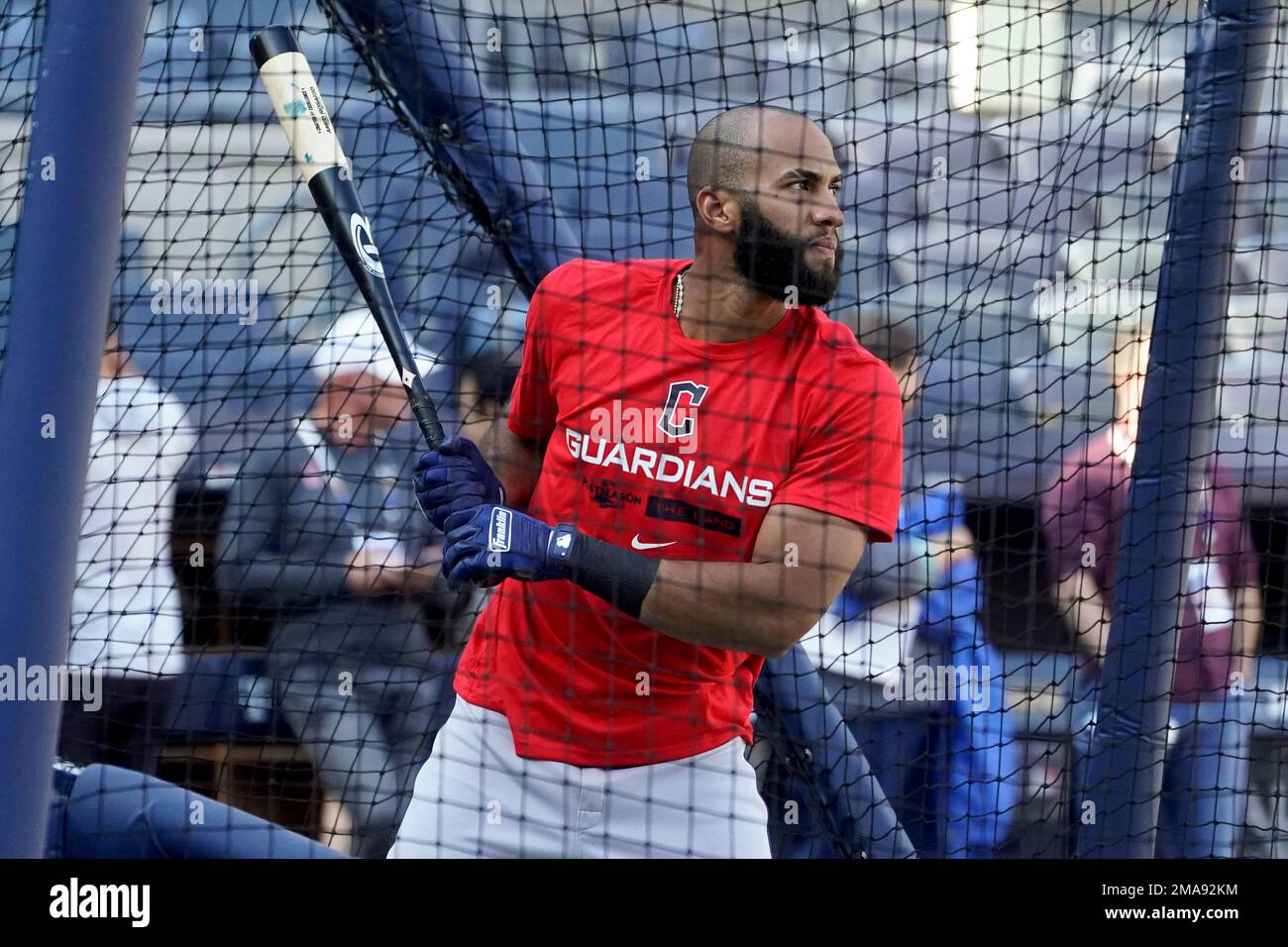 Cleveland Guardians' Amed Rosario bats during a workout ahead of Game 1 ...