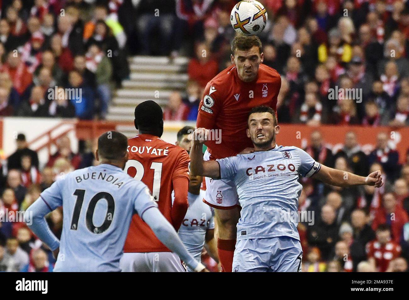 Nottingham Forest's Harry Toffolo, top, jumps for a high ball above ...