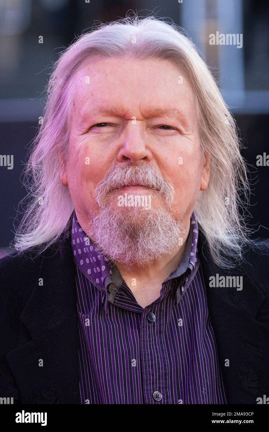 Christopher Hampton poses for photographers upon arrival for the ...