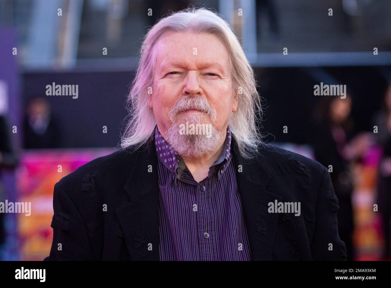 Christopher Hampton poses for photographers upon arrival for the ...