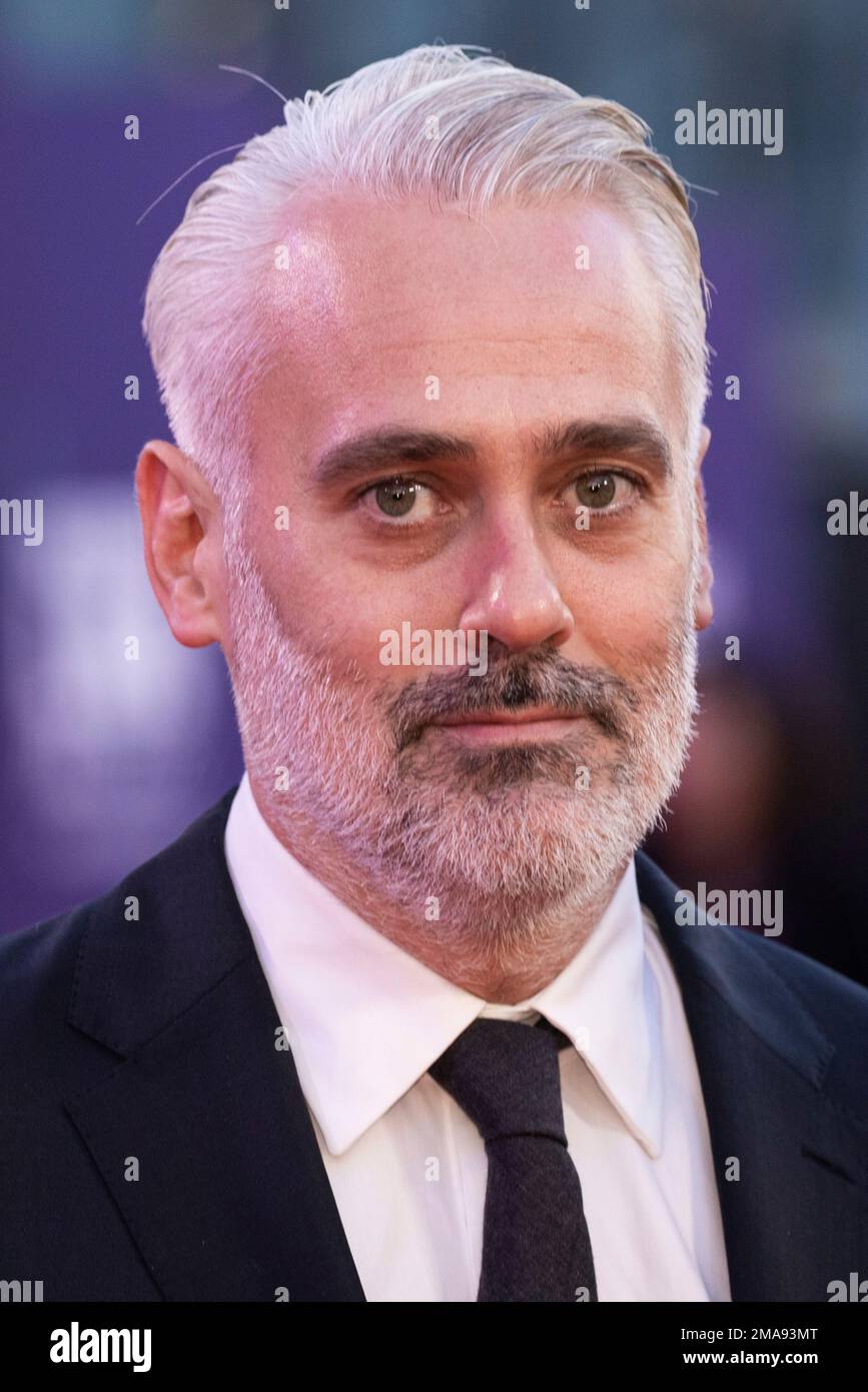 Iain Canning poses for photographers upon arrival for the premiere of ...