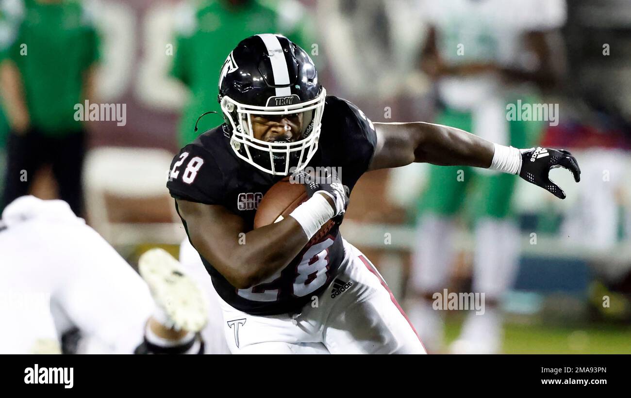 Troy running back Kimani Vidal (28) carries the ball against Marshall ...