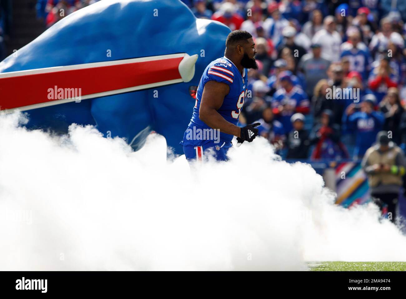 Buffalo Bills defensive tackle Jordan Phillips (97) runs onto the field ...