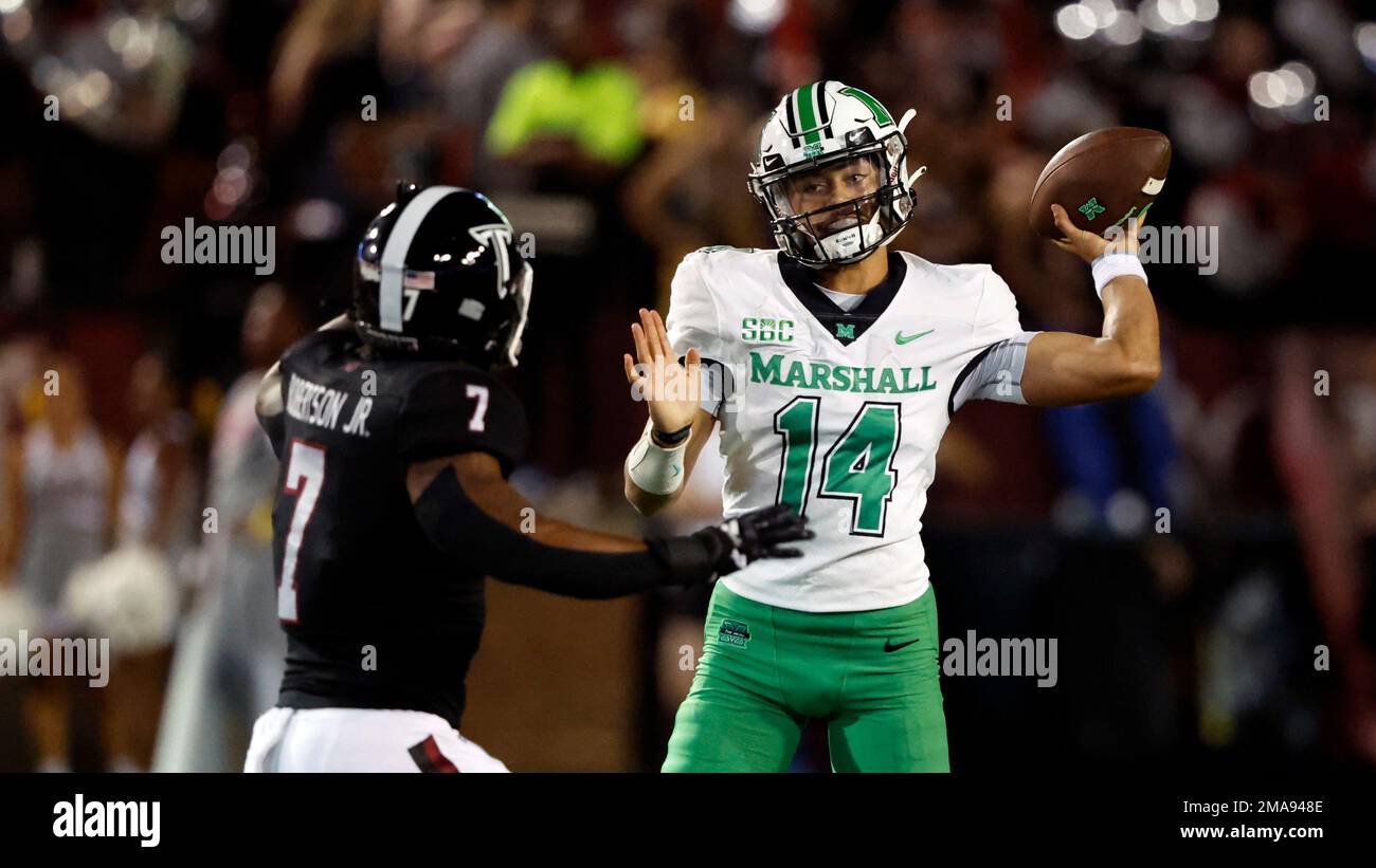 Marshall quarterback Cam Fancher (14) throws a pass as Troy linebacker ...