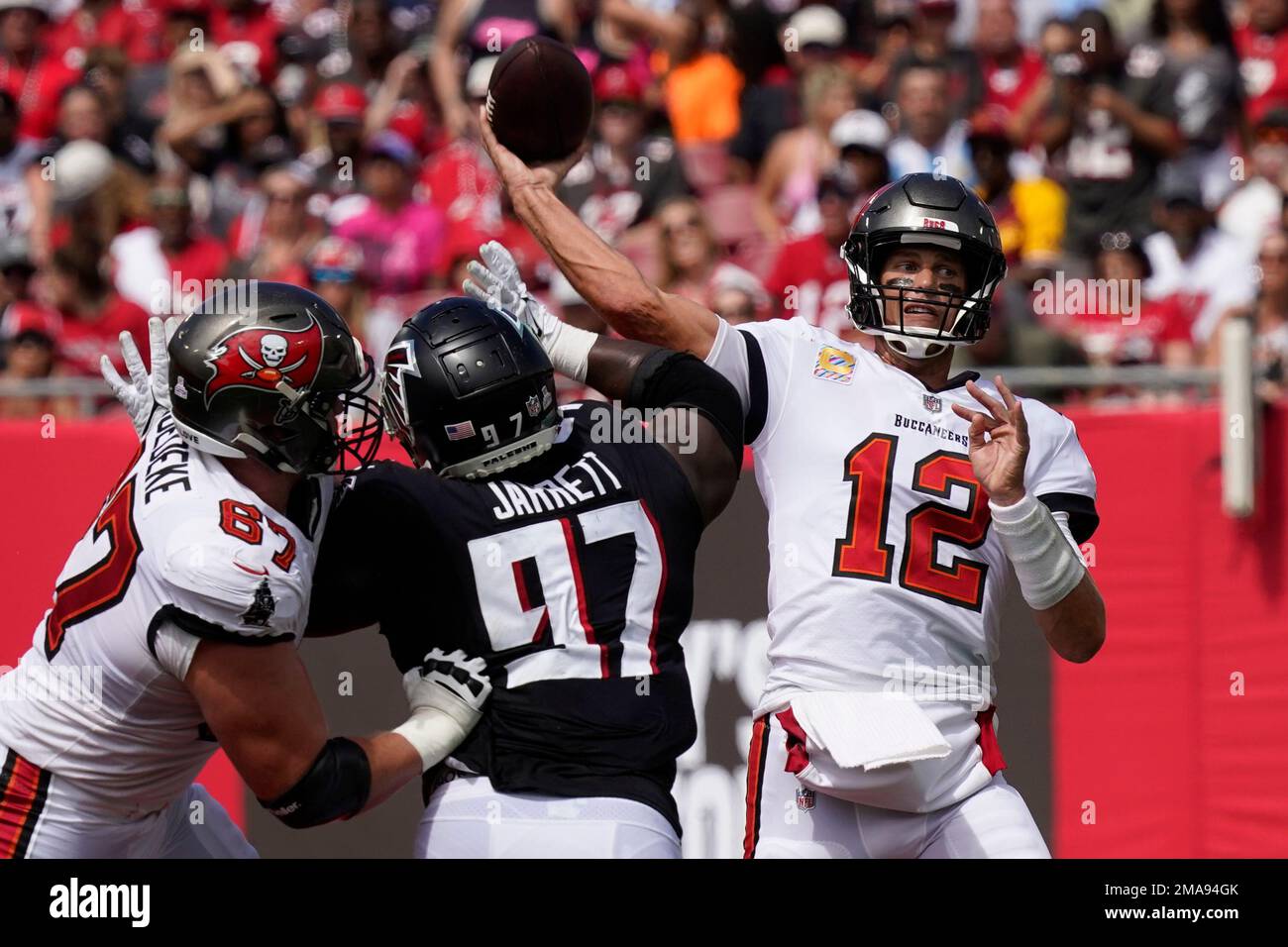 Tampa Bay Buccaneers quarterback Tom Brady (12) is pressured by Atlanta ...
