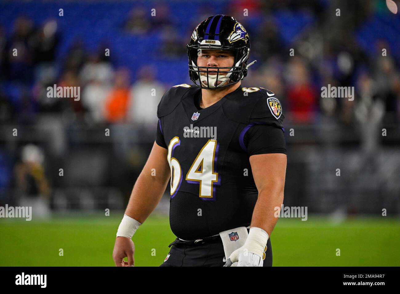 Baltimore Ravens center Tyler Linderbaum (64) looks on during pre-game ...
