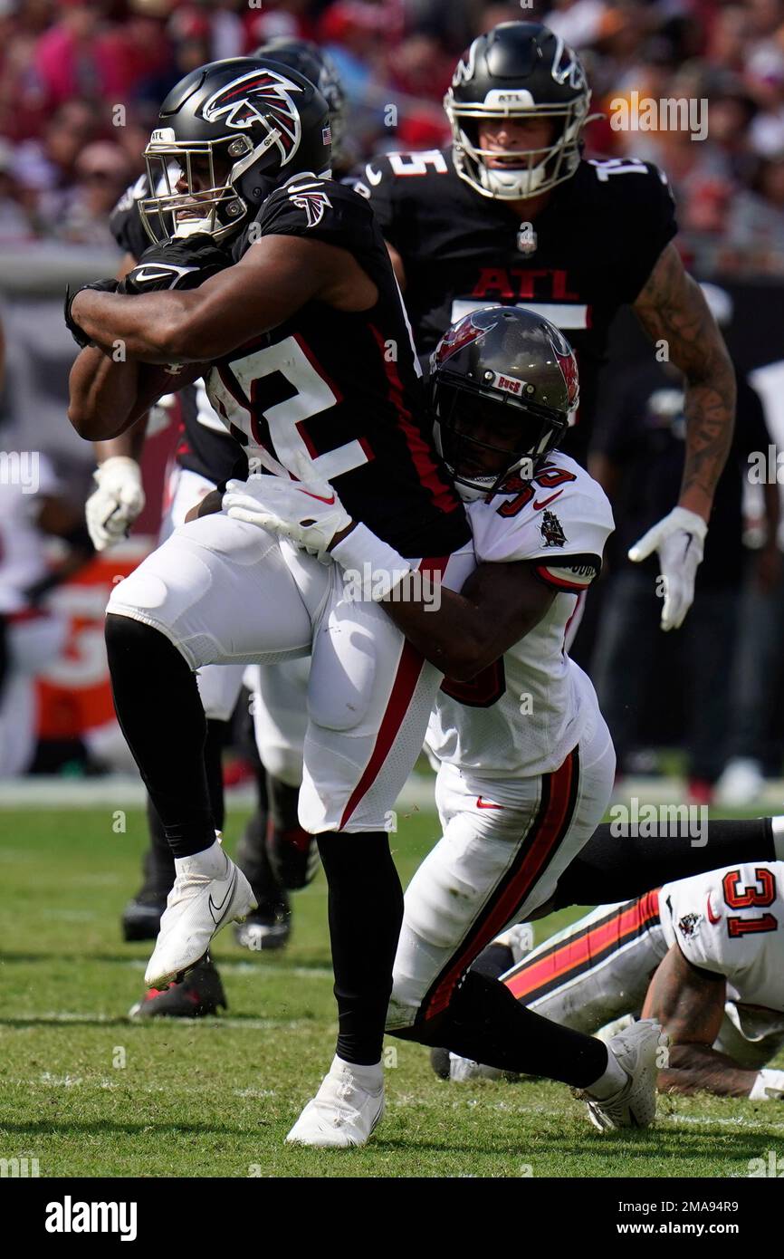 Atlanta Falcons running back Caleb Huntley (42) is stopped by Tampa Bay ...