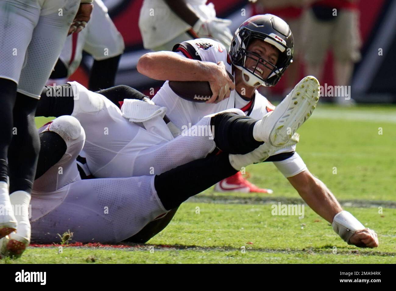 Tampa Bay Buccaneers quarterback Tom Brady (12) is sacked by Atlanta ...