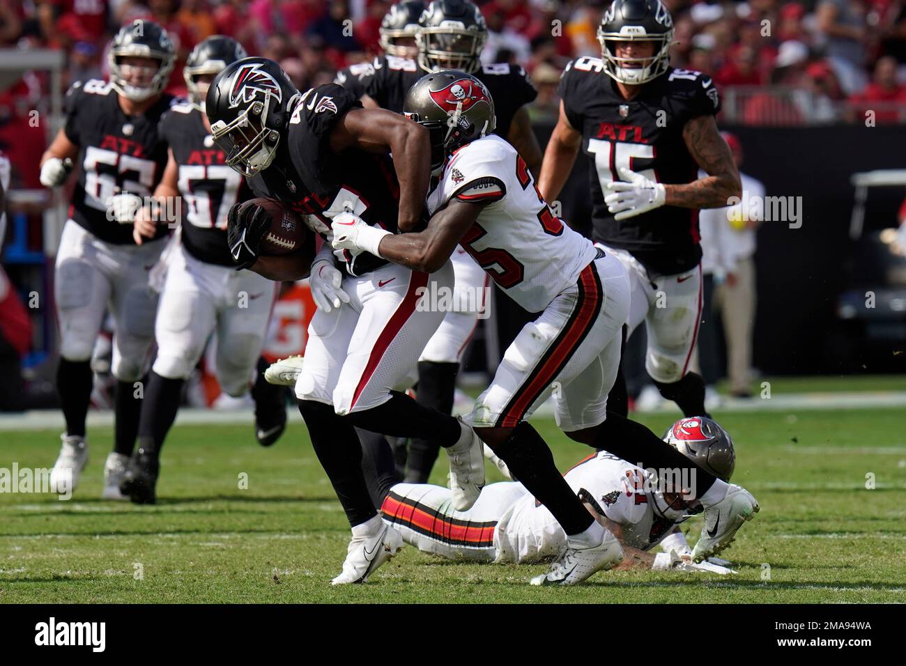 Atlanta Falcons running back Caleb Huntley (42) is stopped by Tampa Bay ...
