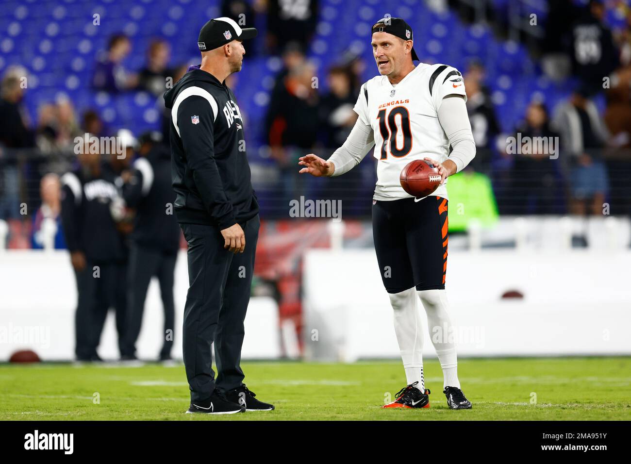 Cincinnati Bengals punter Kevin Huber (10) talks with special teams ...