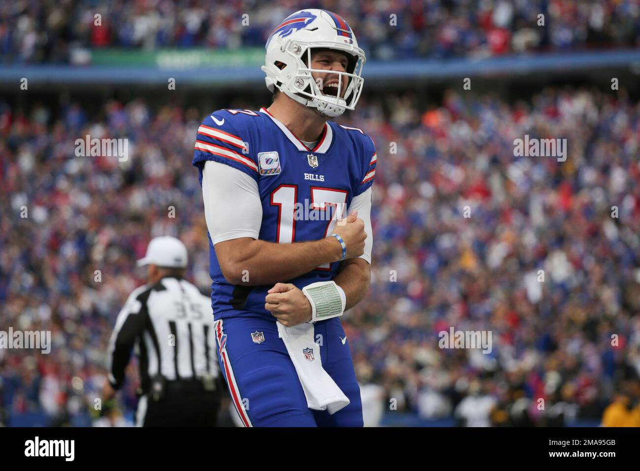 Buffalo Bills quarterback Josh Allen (17) celebrates after throwing a ...