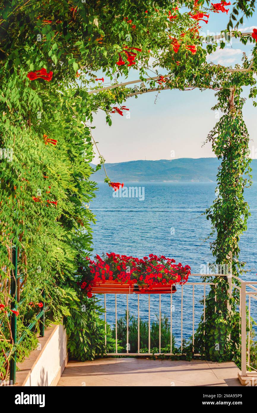 Scenic flowers porch view of the Adriatic Sea along the Dalmatia Coast ...