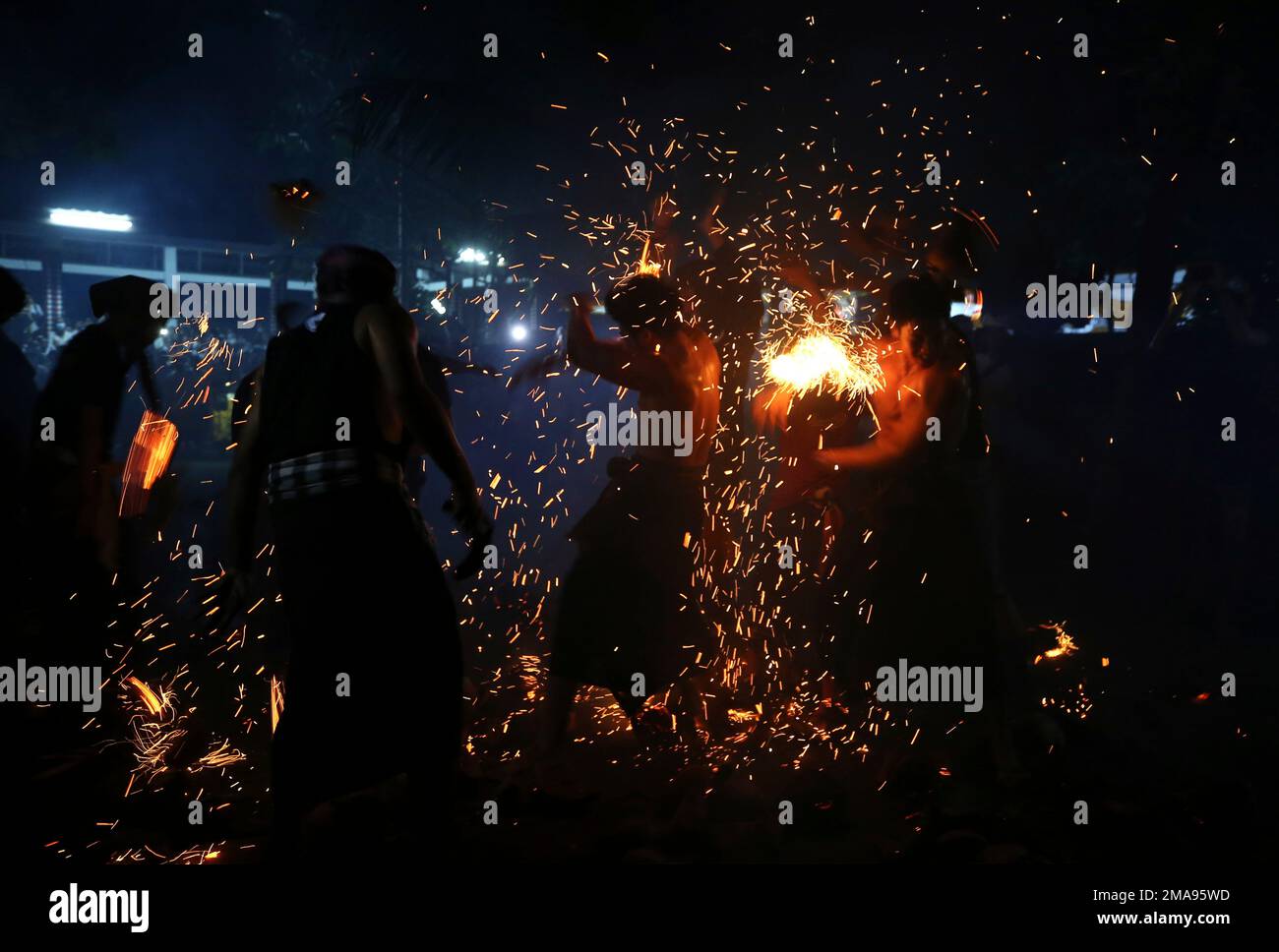 Men lash each other with burning coconut husks during the annual ...