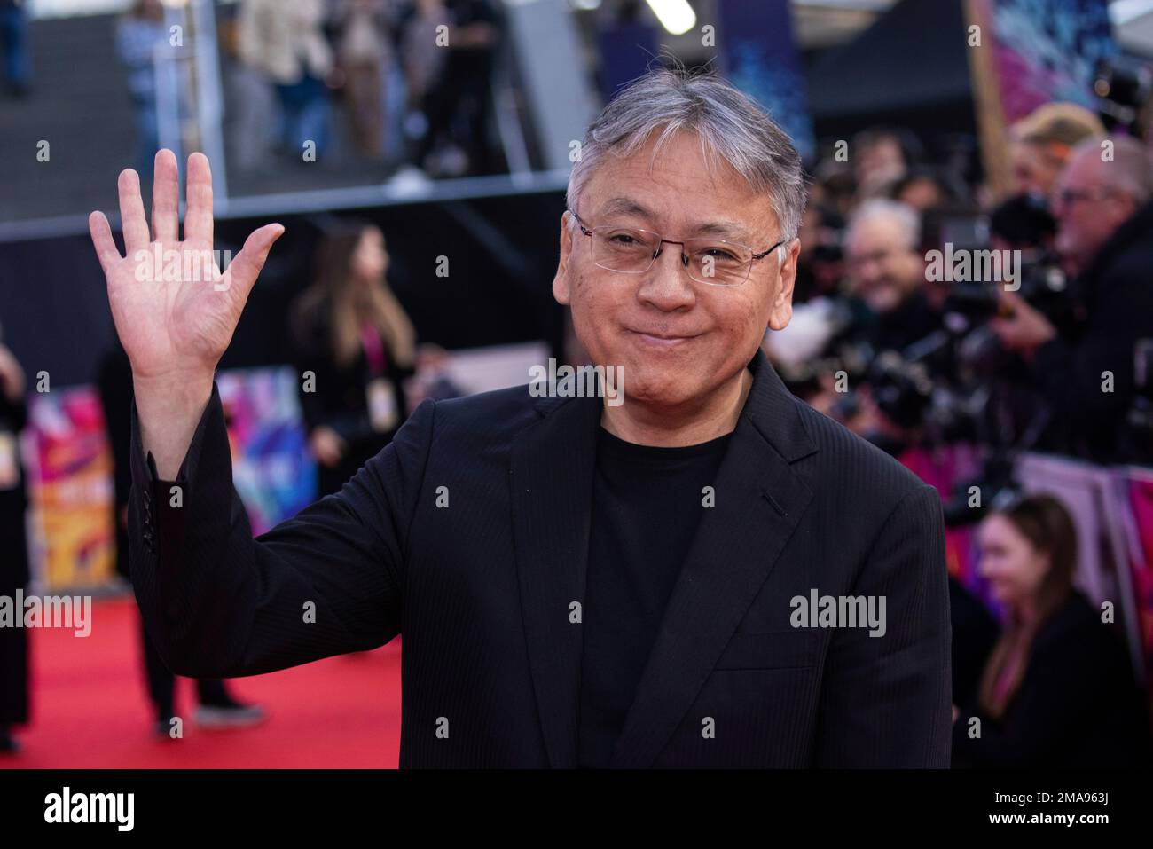 Kazuo Ishiguro poses for photographers upon arrival for the premiere of ... Kazuo Ishiguro poses for photographers upon arrival for the premiere of ...