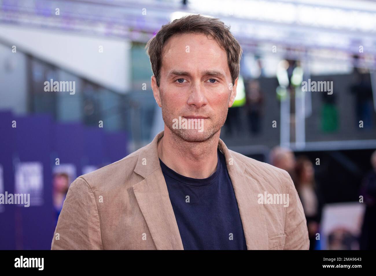 Oliver Chris poses for photographers upon arrival for the premiere of ...