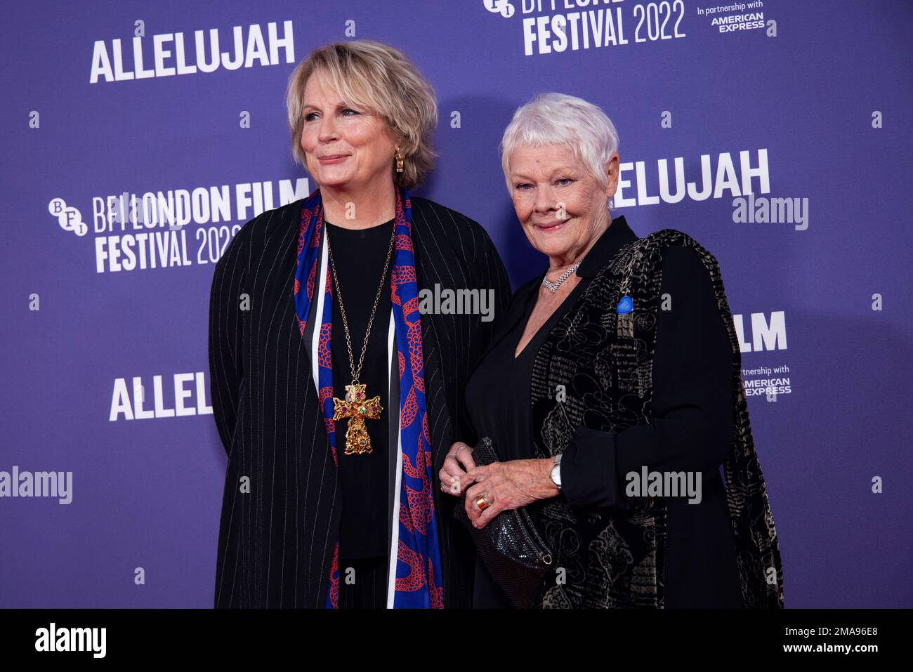 Jennifer Saunders, left, and Judi Dench pose for photographers upon ...