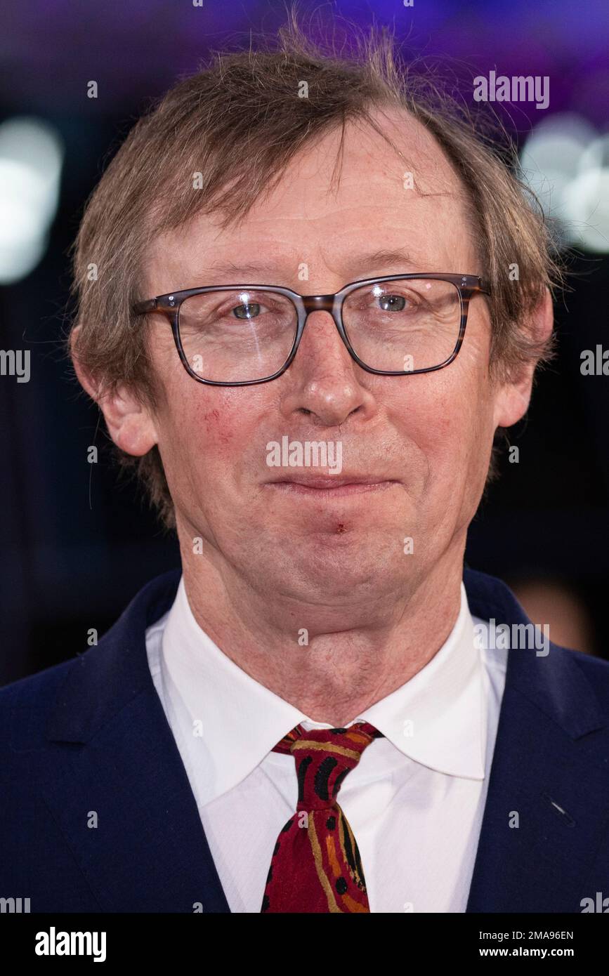 Kevin Loader poses for photographers upon arrival for the premiere of ...