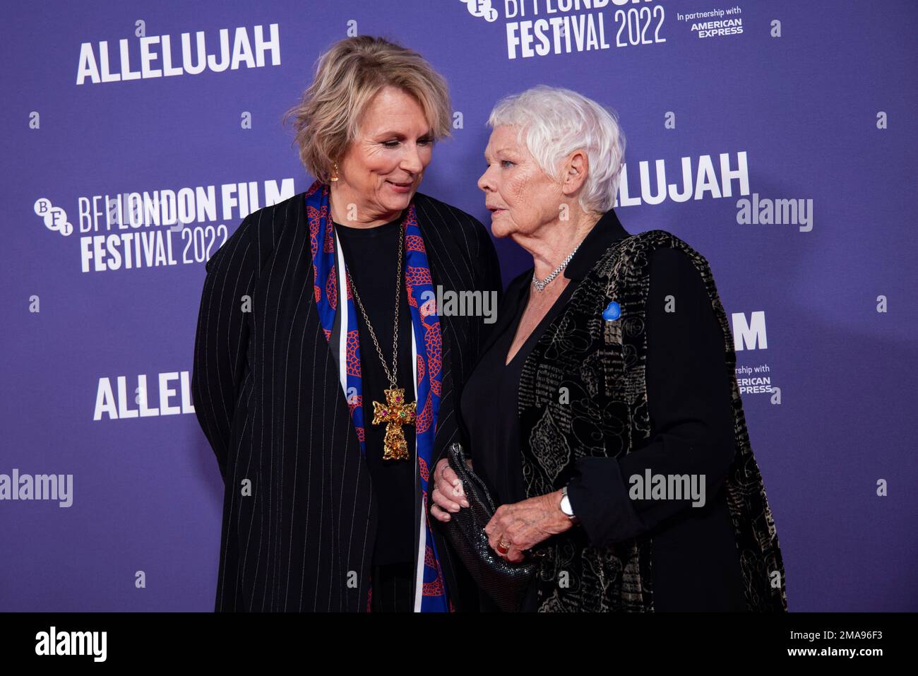 Jennifer Saunders, left, and Judi Dench pose for photographers upon ...