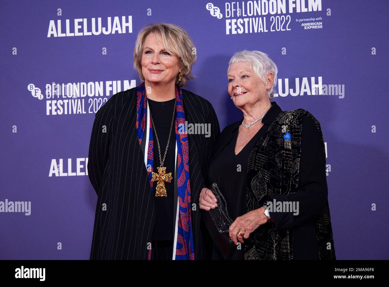 Jennifer Saunders, left, and Judi Dench pose for photographers upon ...