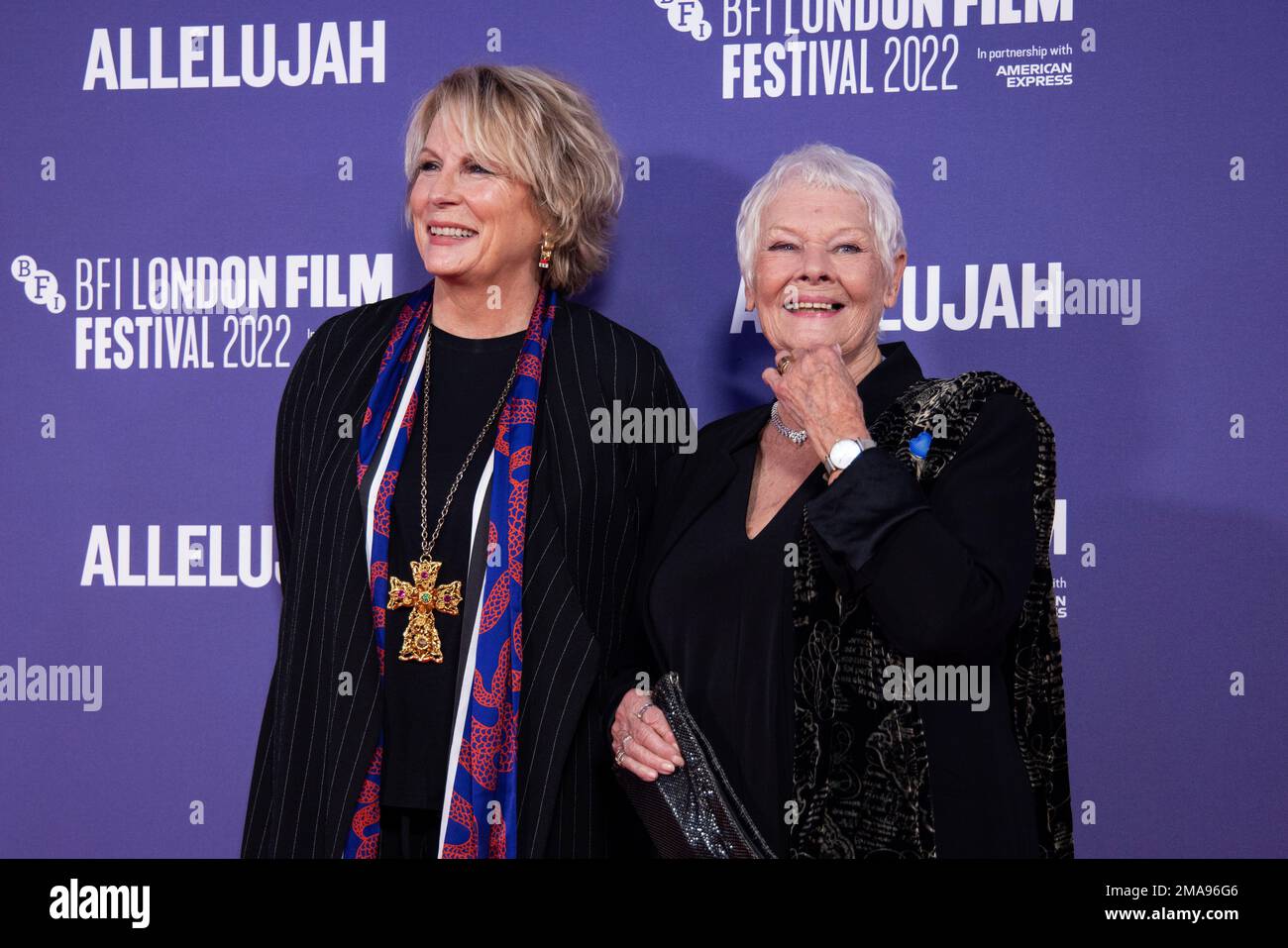 Jennifer Saunders, left, and Judi Dench pose for photographers upon ...