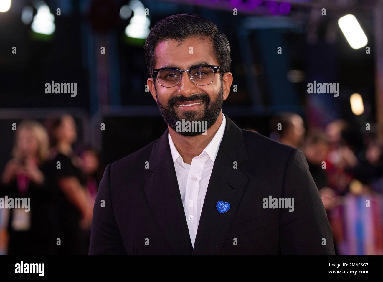 Bally Gill poses for photographers upon arrival for the premiere of the ...