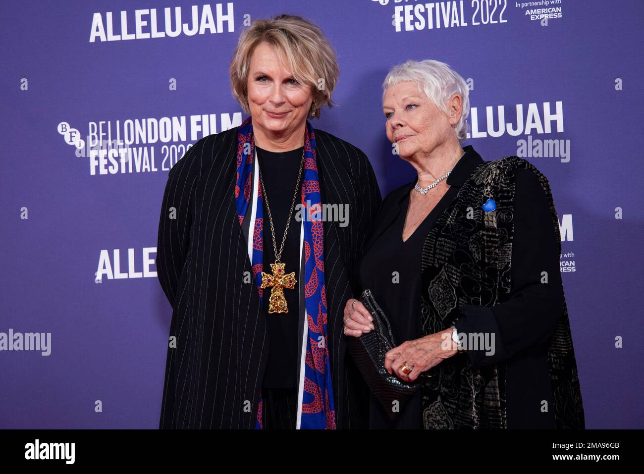 Jennifer Saunders, left, and Judi Dench pose for photographers upon ...