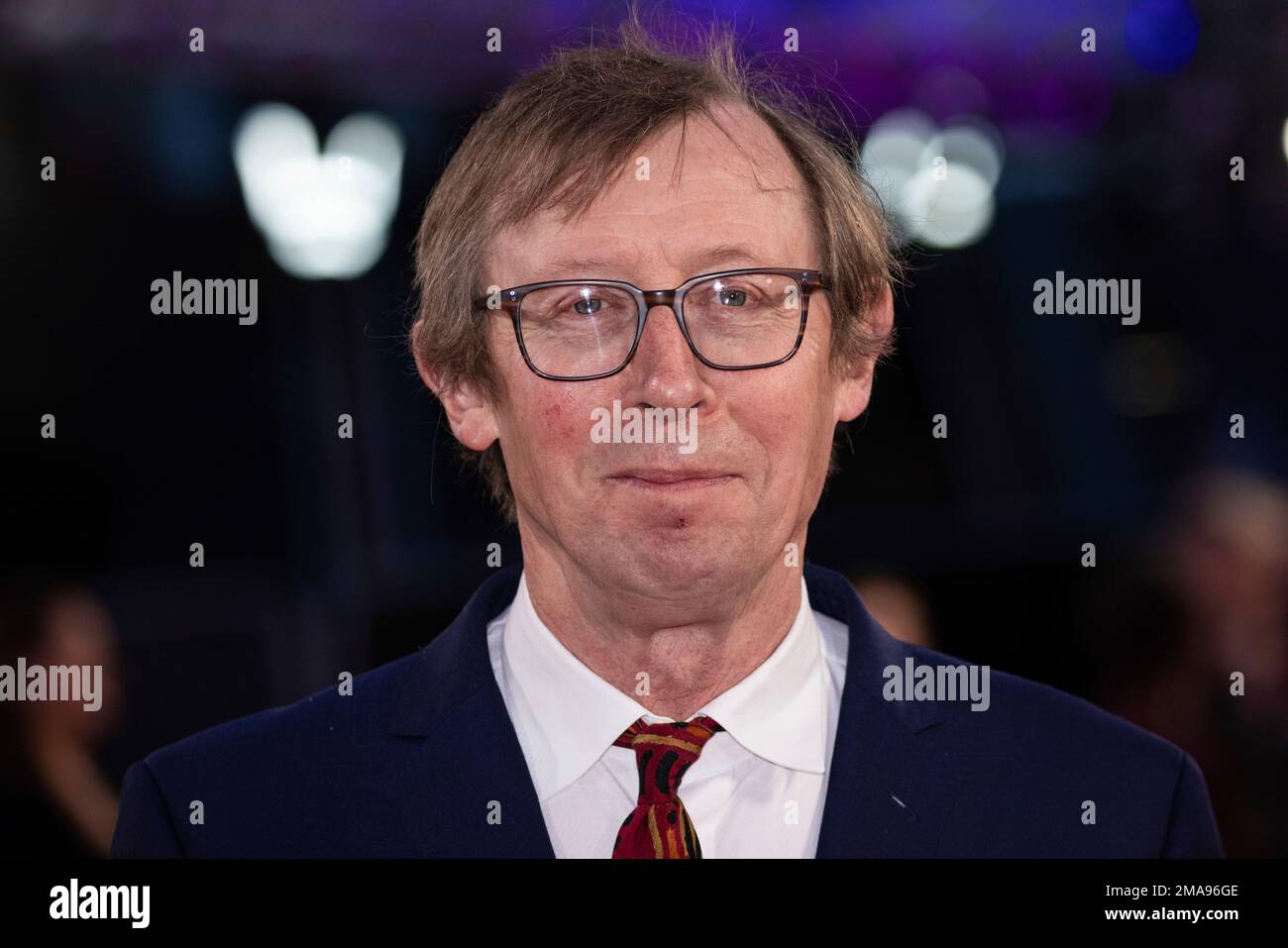 Kevin Loader poses for photographers upon arrival for the premiere of ...