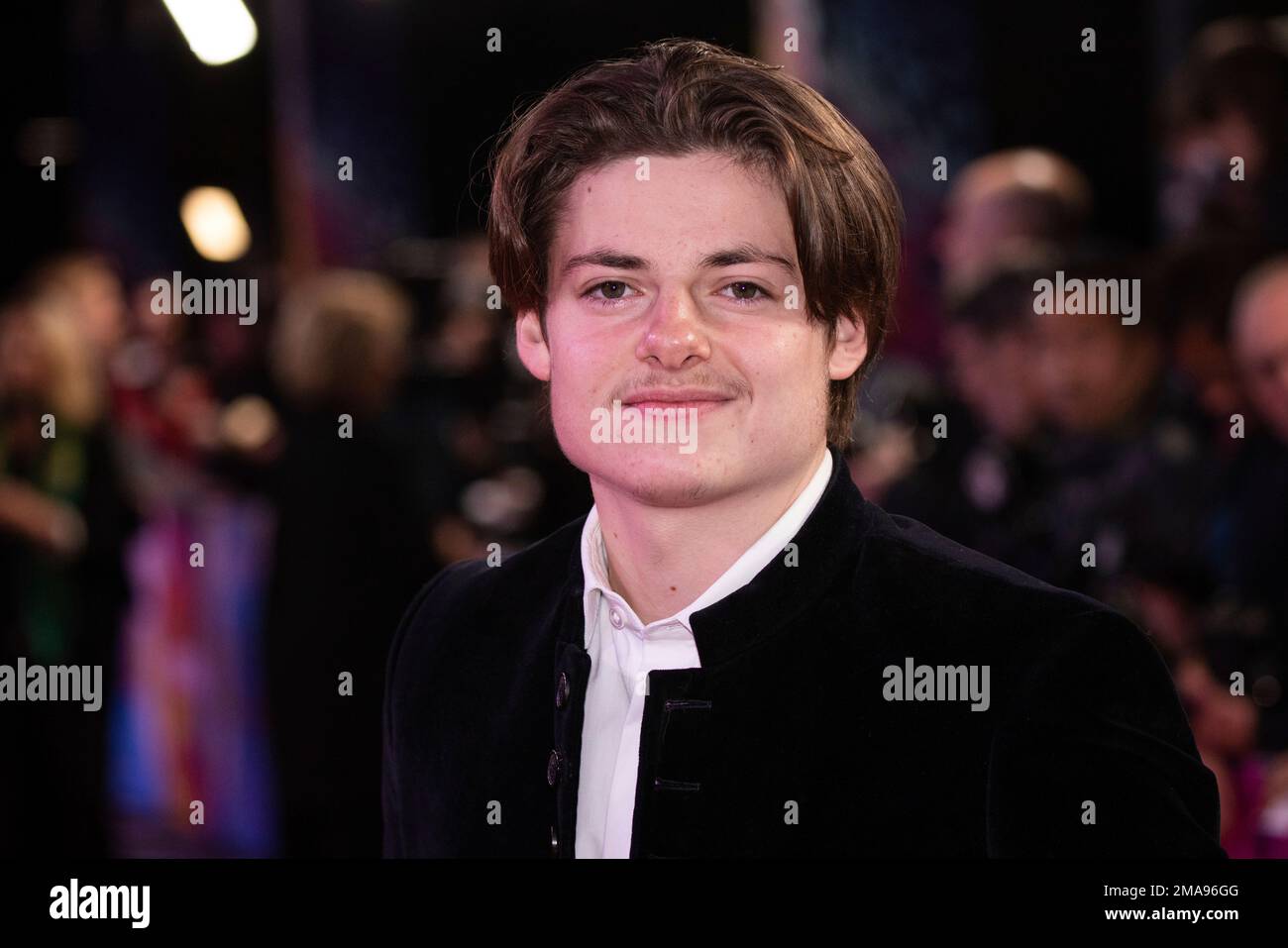 Louis Serkis-Ashbourne poses for photographers upon arrival for the ...