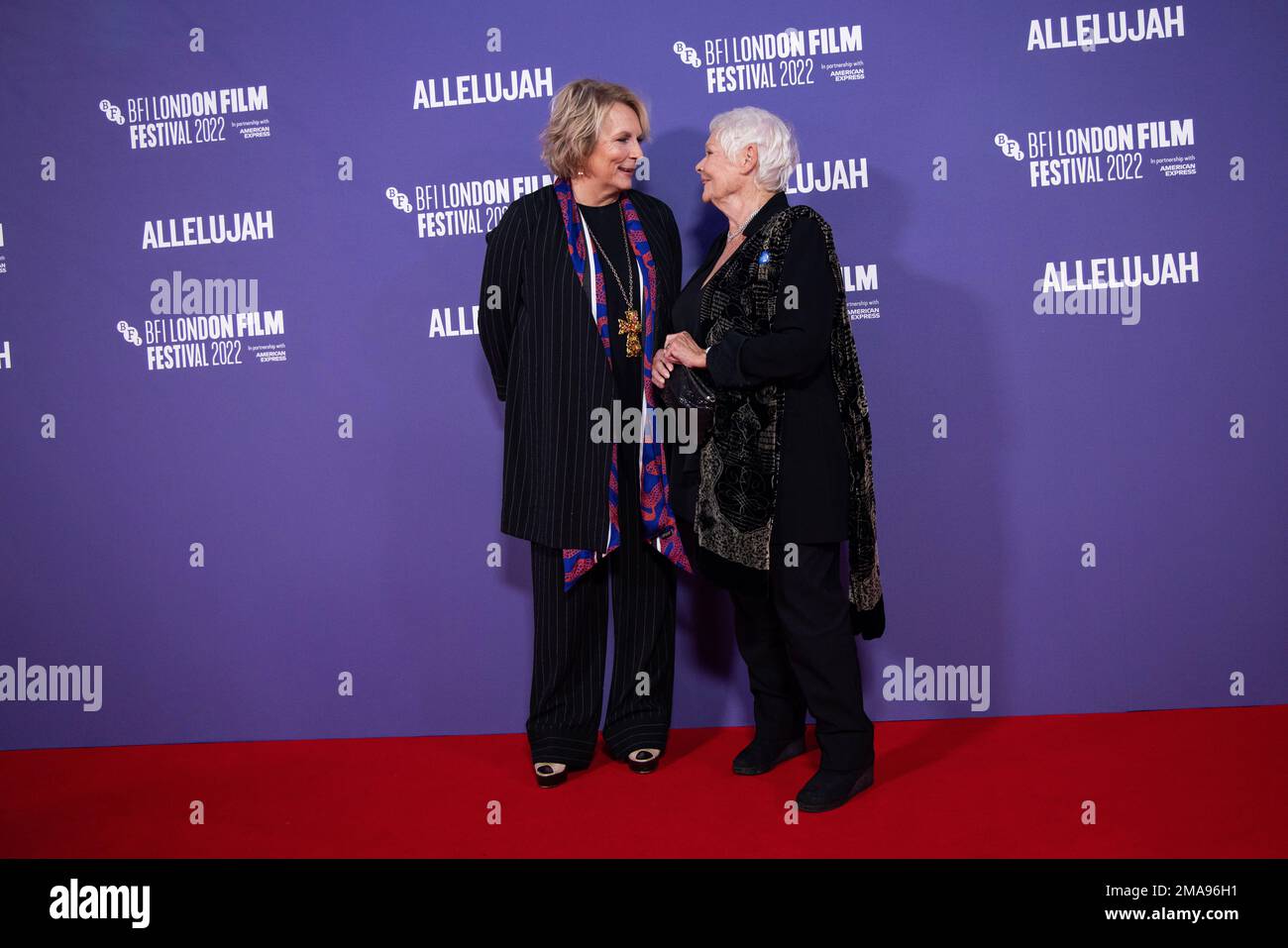 Jennifer Saunders, left, and Judi Dench pose for photographers upon ...