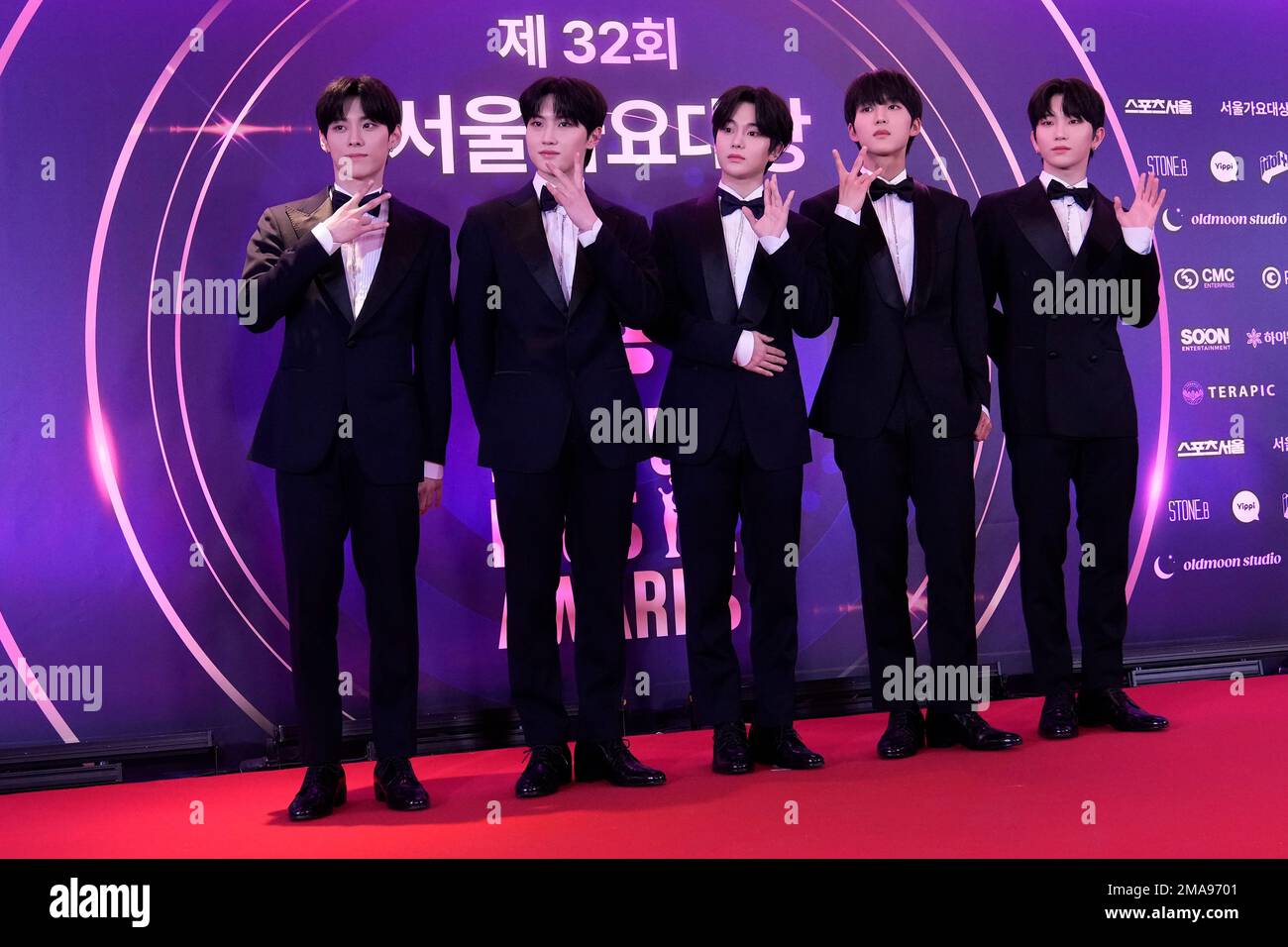 South Korean K-Pop group TNX members pose prior to the Seoul Music ...