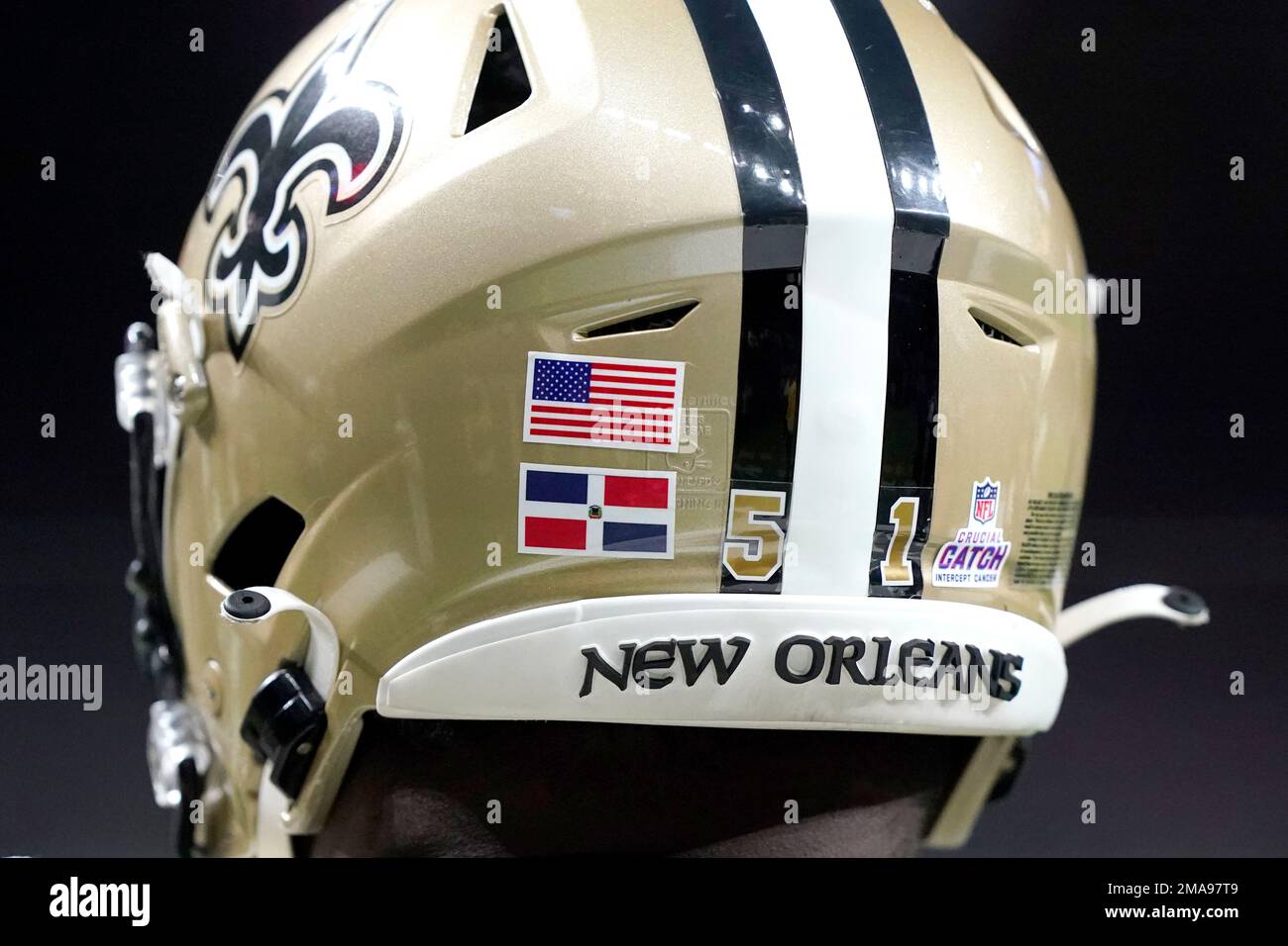 New Orleans Saints center Cesar Ruiz showing an American flag ...