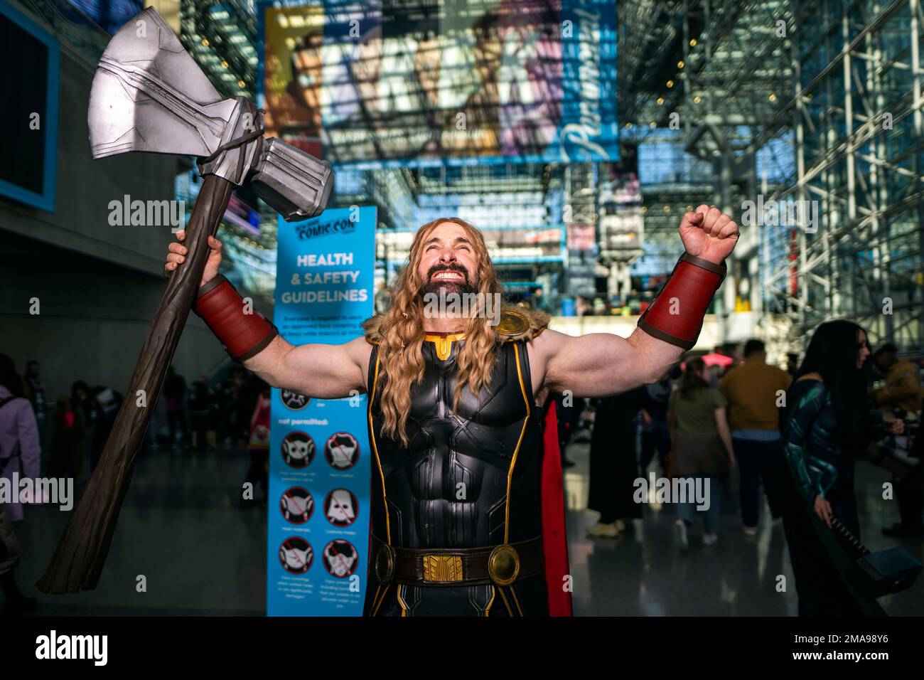 An attendee dressed as Thor poses during New York Comic Con at the ...
