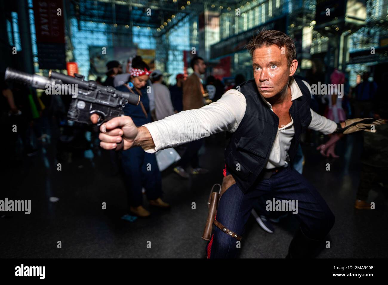 An attendee dressed as Han Solo poses during New York Comic Con at the ...