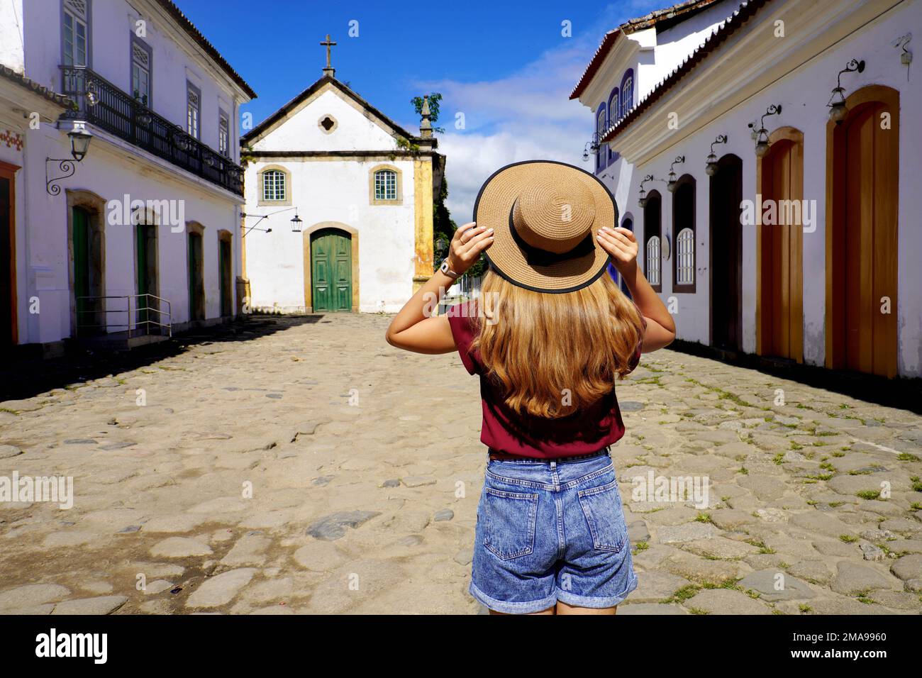 Beautiful girl visiting the historic city of Paraty, Rio de janeiro ...