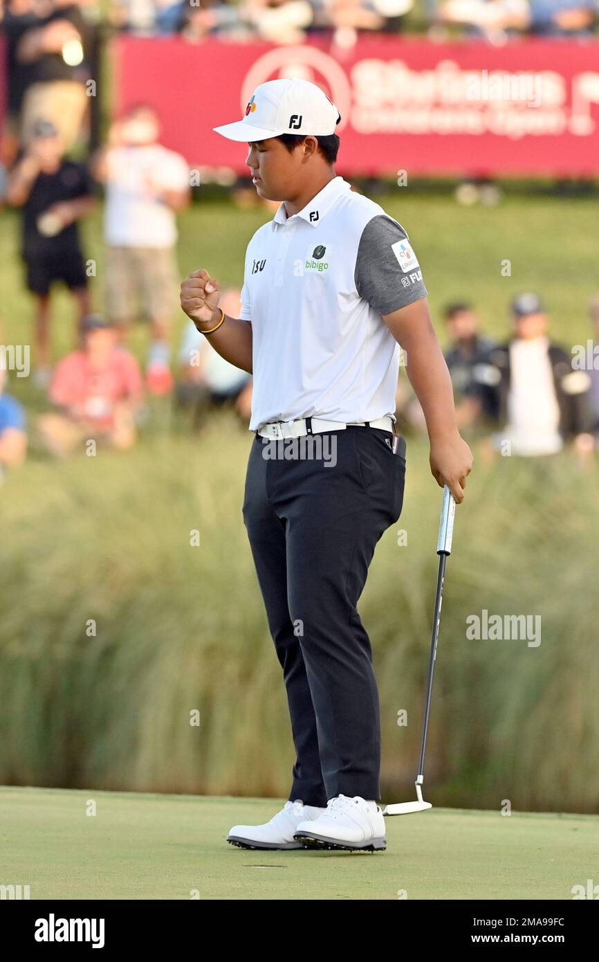 Tom Kim, of South Korea, reacts after winning the Shriners Children's ...