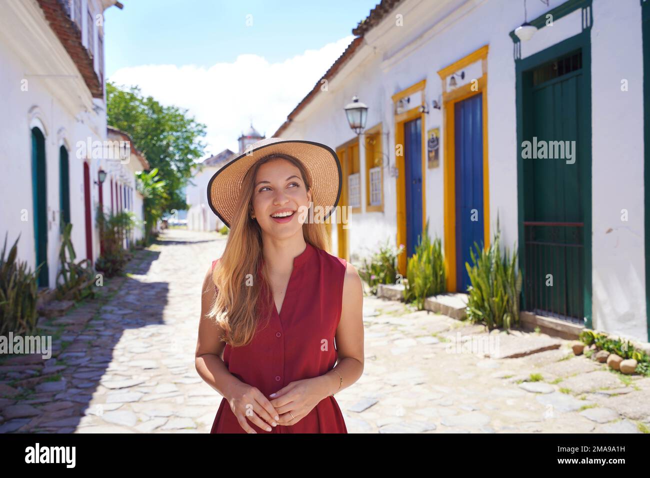 Beautiful elegant girl visiting Brazil. Holidays in the colonial ...