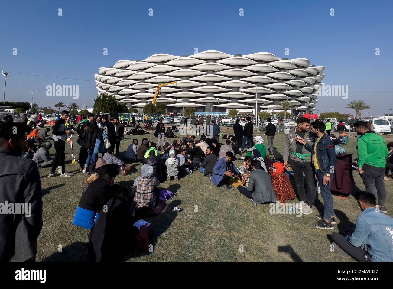 Football fans gather outside the Basra International Stadium in Basra ...