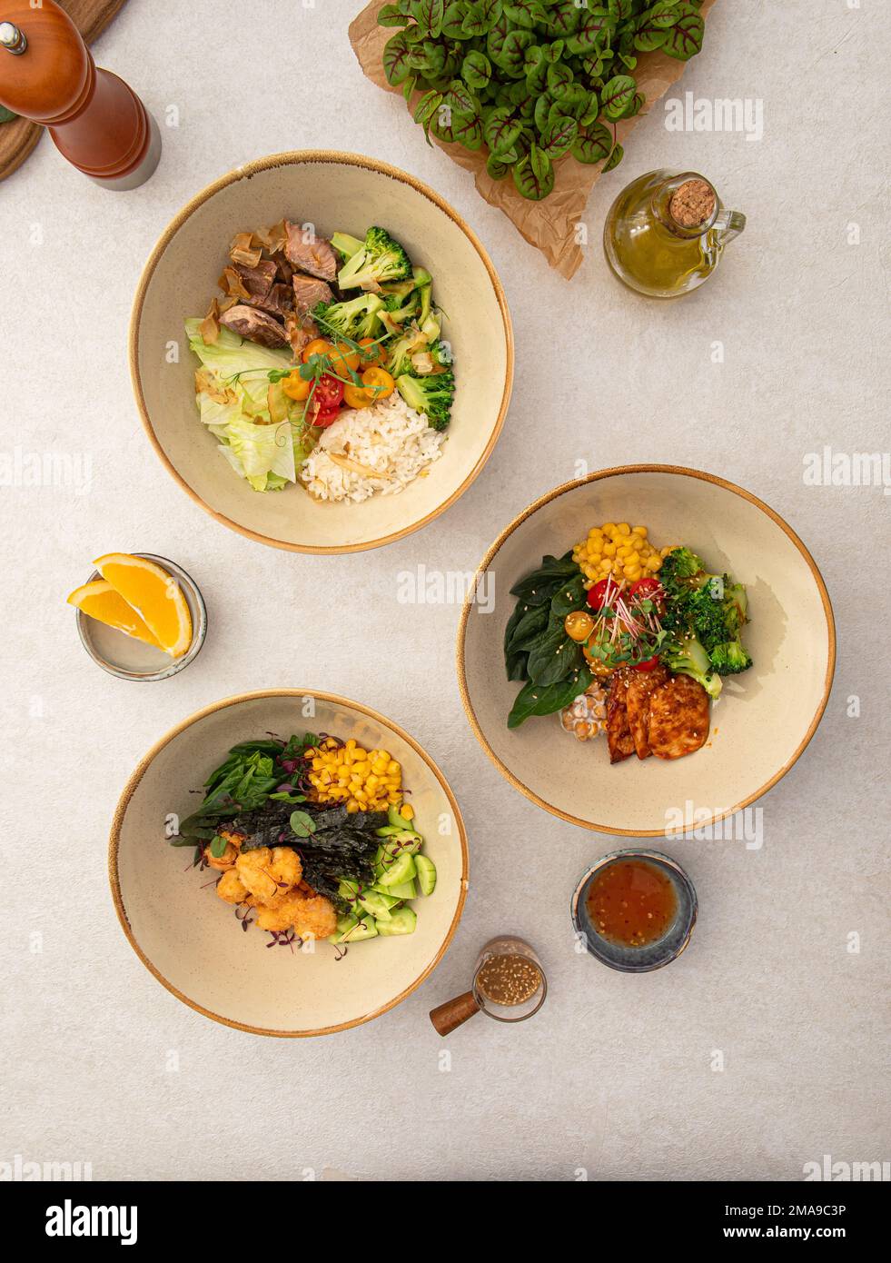 Three assorted poke bowl dishes Stock Photo - Alamy