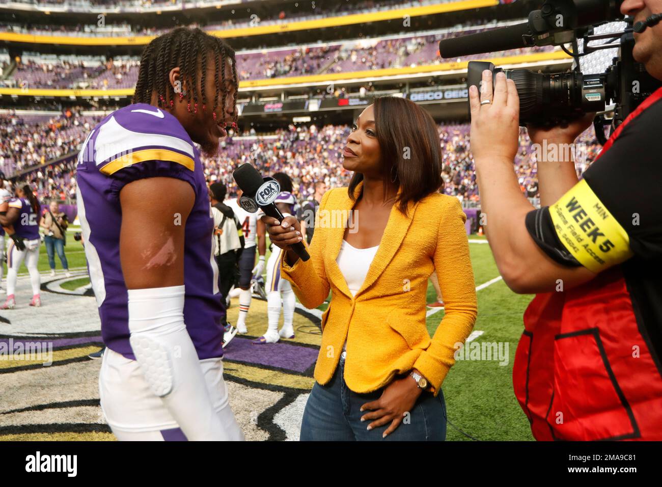 Minnesota Vikings wide receiver Justin Jefferson (18) is interviewed by ...
