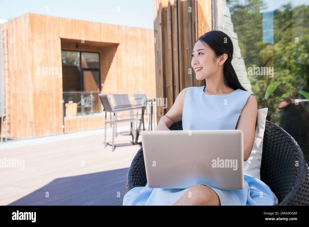 A young woman use the computer Stock Photo - Alamy
